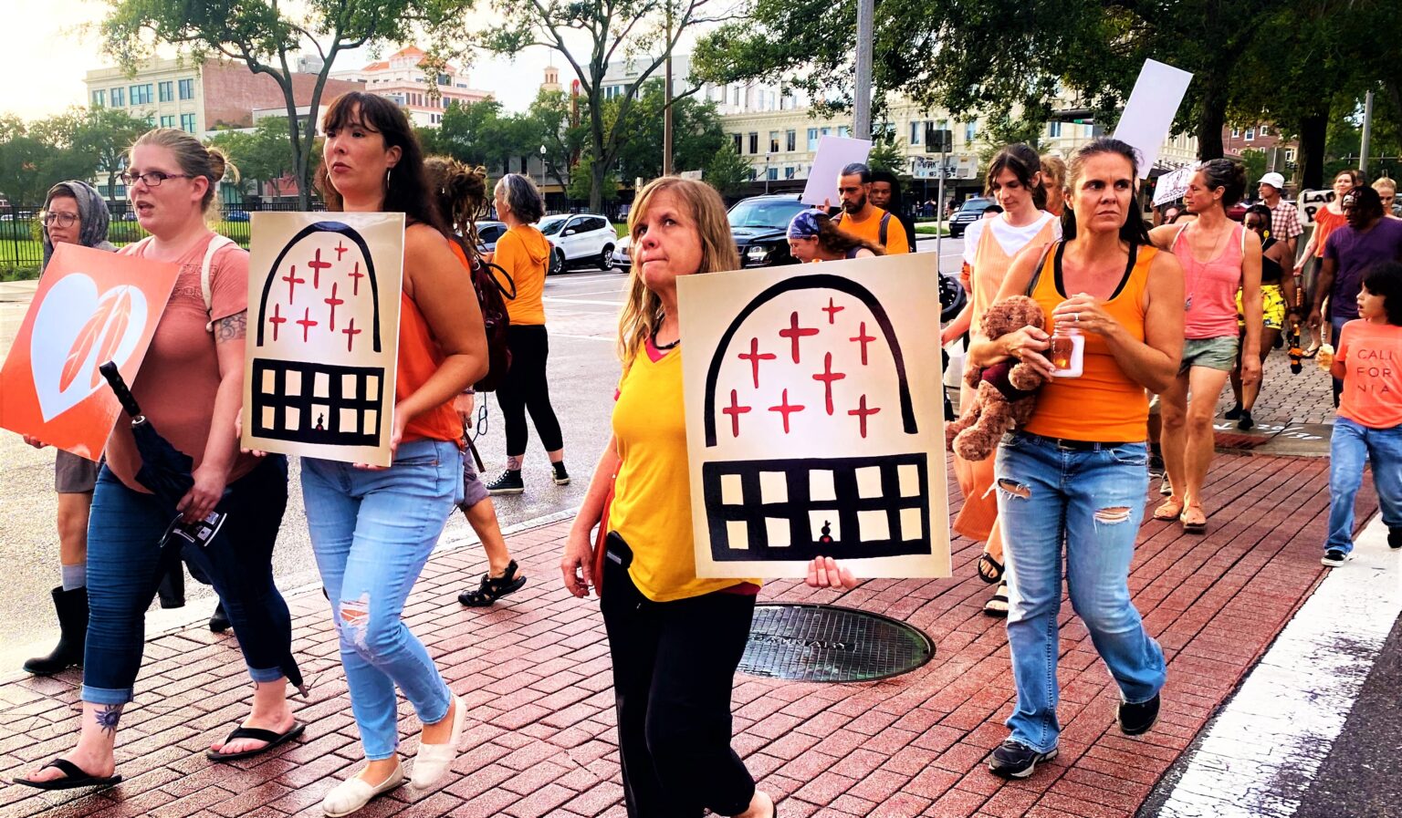 Florida Indigenous activists protest massacres of native children at ...
